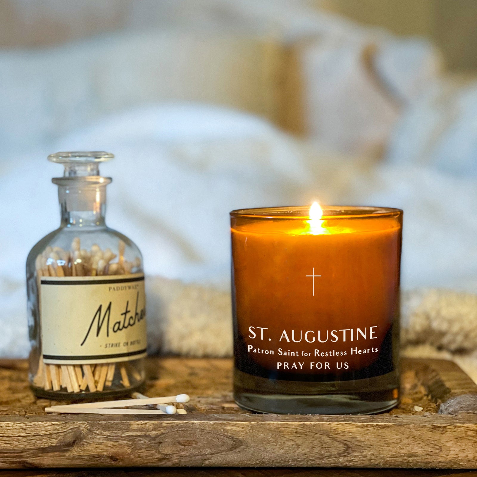 Amber Glass St. Augustine Healing Candle | The Catholic Company®