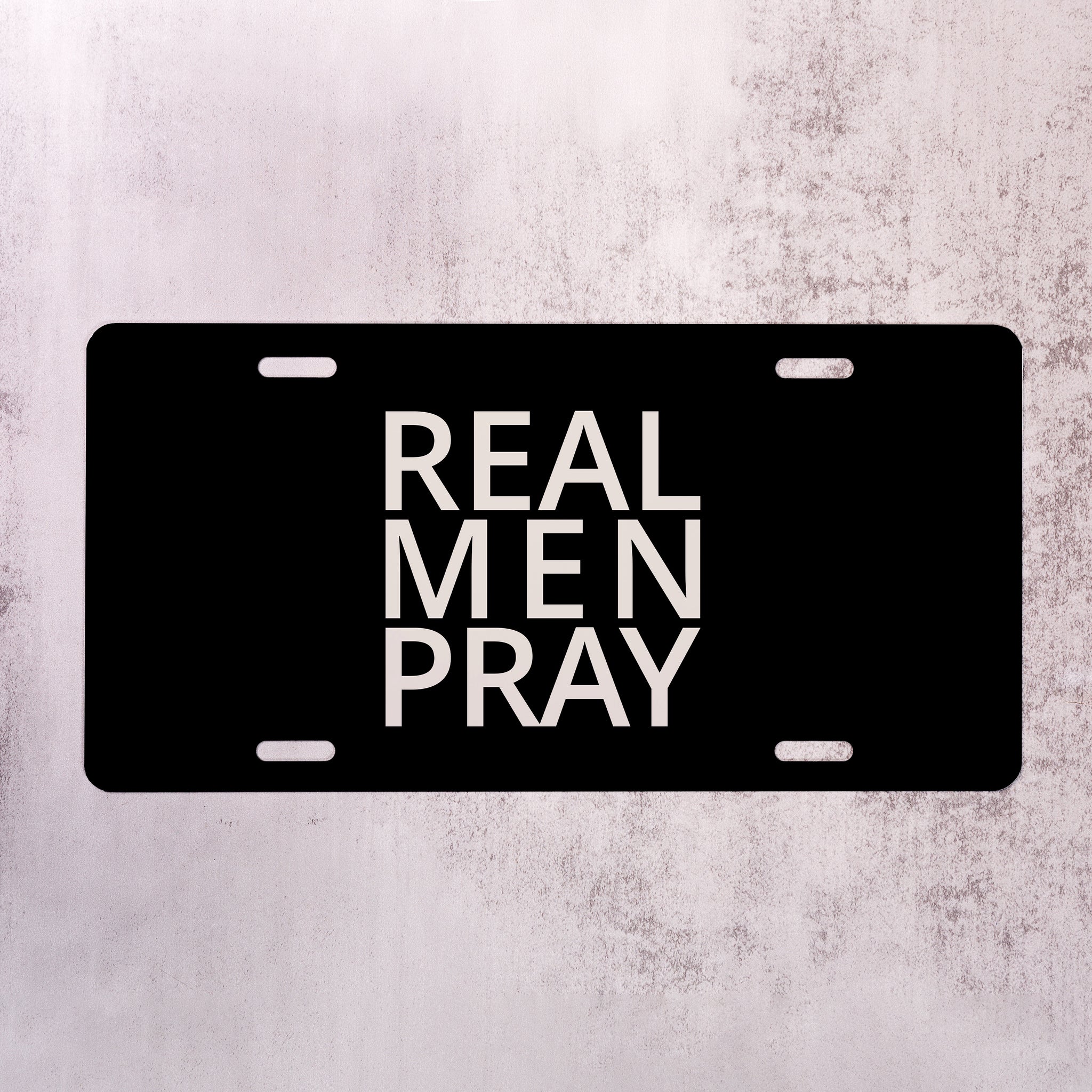 Real Men Pray License Plate | The Catholic Company®